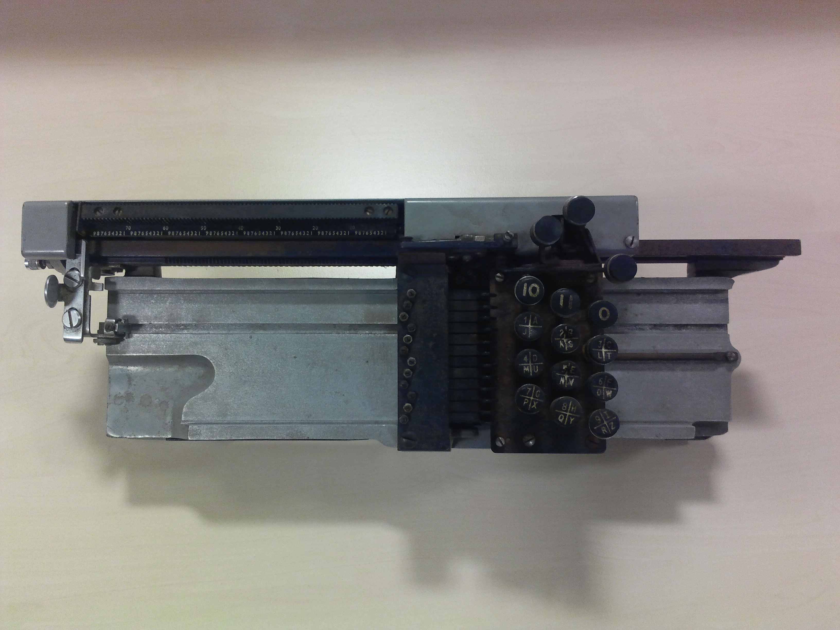 What is written on the keys of an ICL Hand Card Punch?